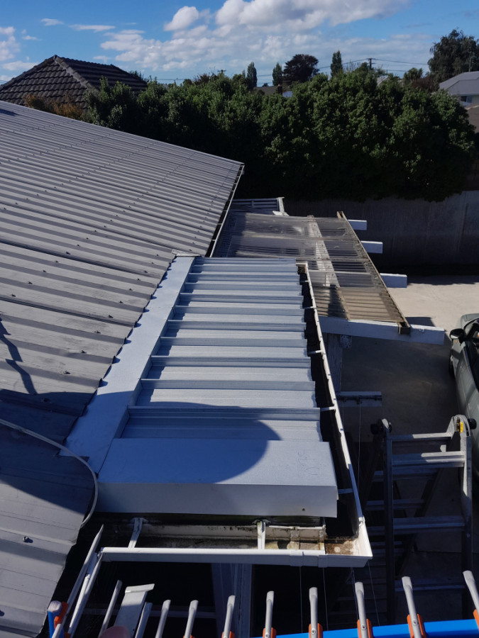 Reroof on pop out | Builderscrack