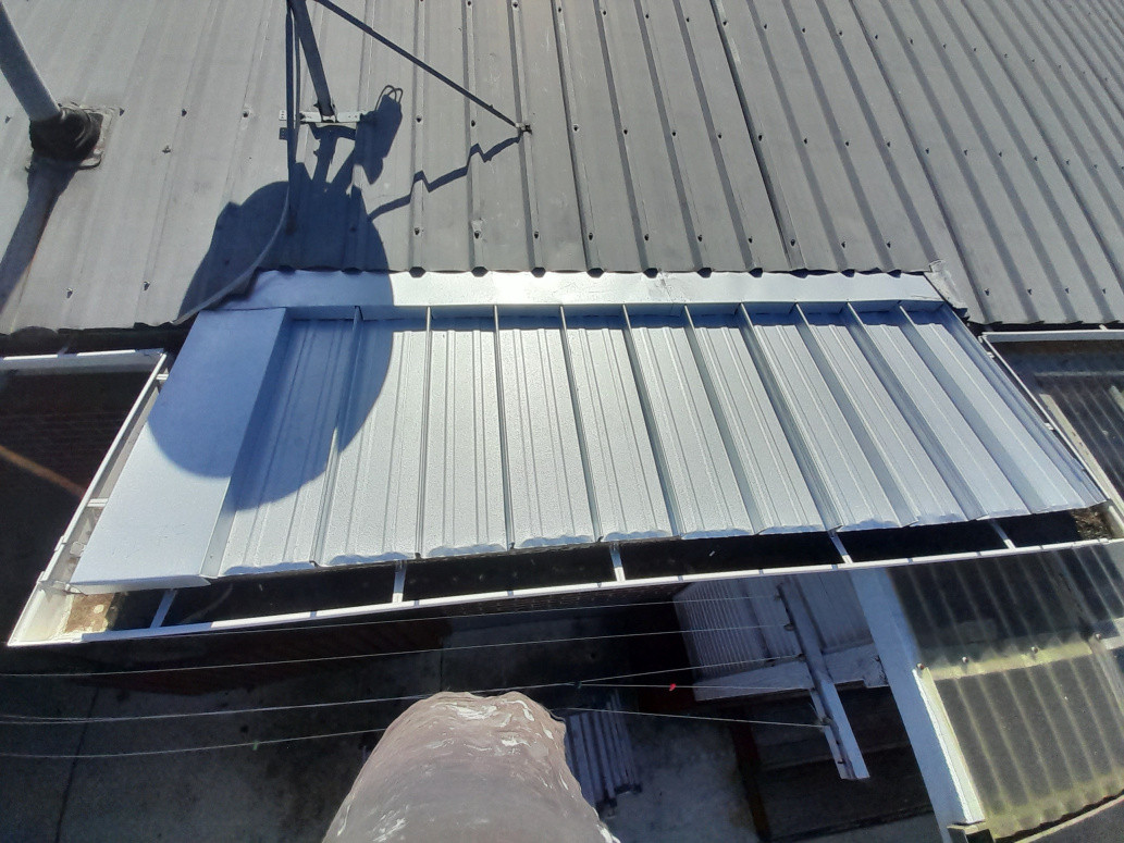 Reroof on pop out | Builderscrack