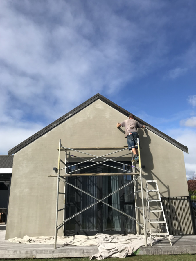 Exterior staining of a beautiful cedar house | Builderscrack