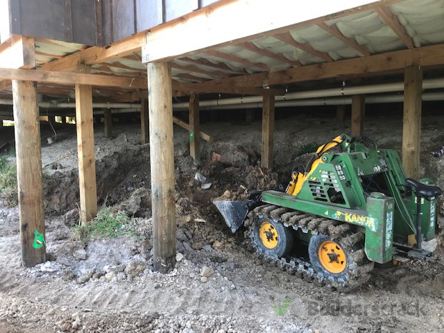 Digging under a house for a storage space | Builderscrack