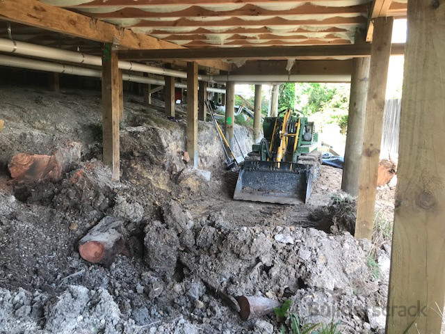 Digging under a house for a storage space | Builderscrack