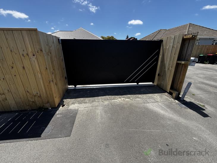 Ashphalt around new sliding gate (#1210536) | Builderscrack