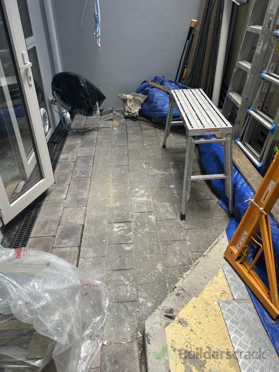 Relay concrete pavers in small courtyard (#1218423) | Builderscrack