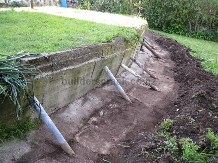 Removal of retaining wall & form battered slope (#68767) | Builderscrack