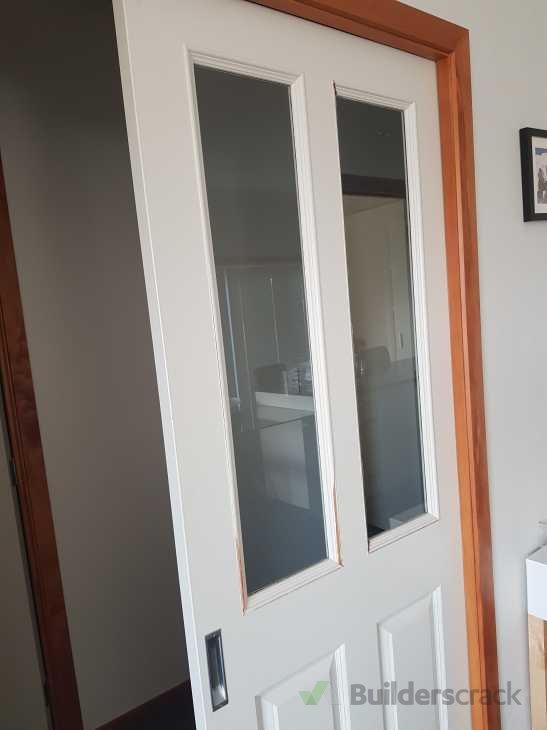 Internal sliding door clashing with skirting and needs repair (or ...