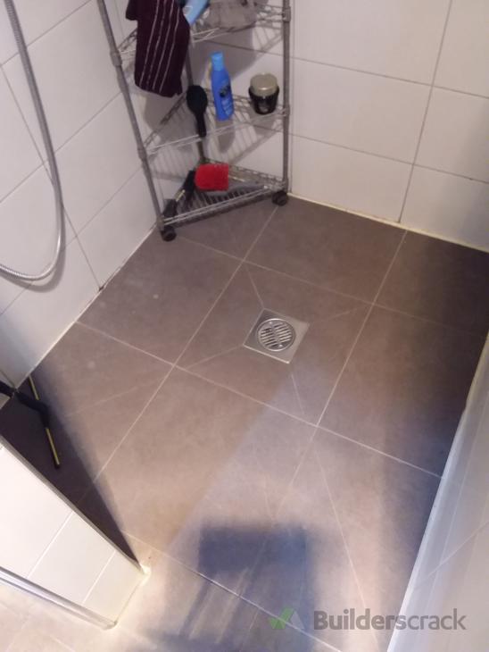 Shower floor re-tiling x 2 (# 359422) | Builderscrack