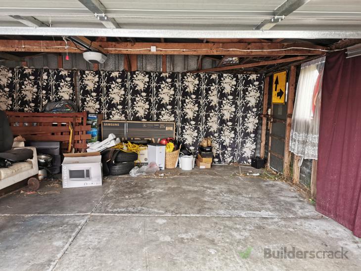 Broken / sunken Garage repair (#567363) | Builderscrack