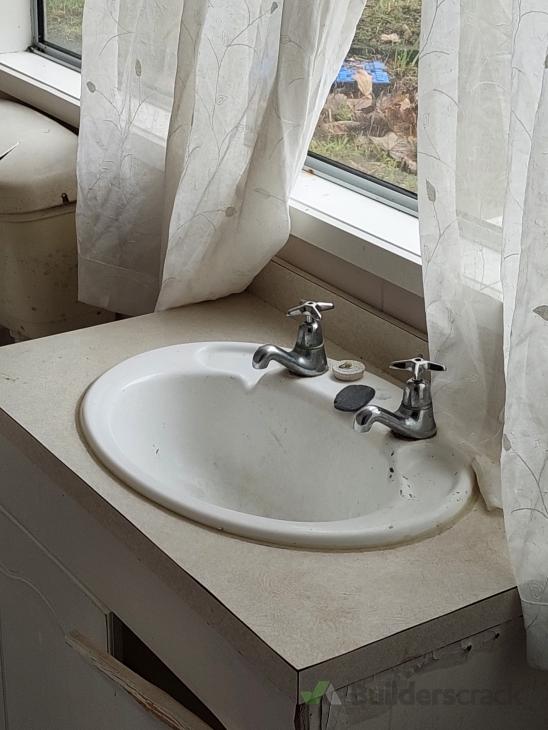 Putting in a new toilet and wash basin (# 617981) | Builderscrack