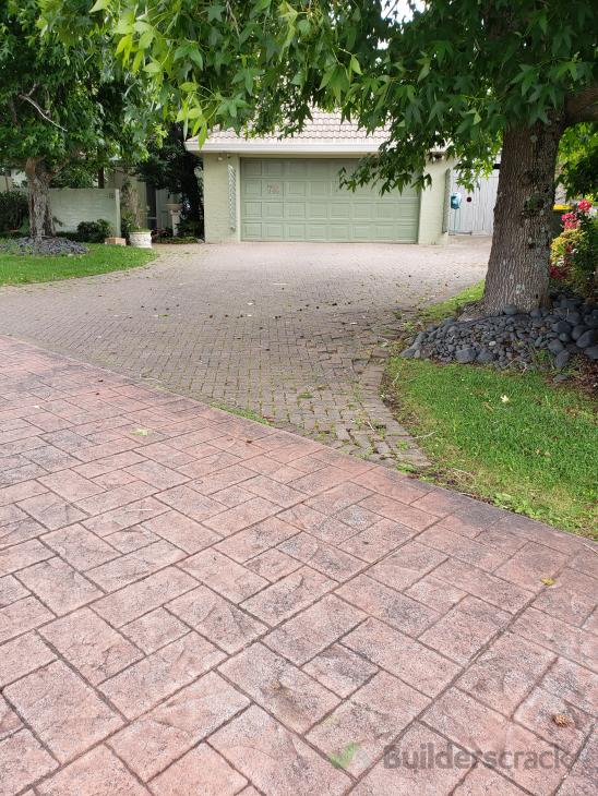 Re-paving parts of driveway damaged by tree roots and subsidence ...